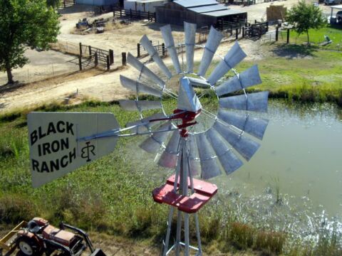Art on the tail vane of windmills | Rock Ridge Windmills